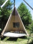 19 Relaxing Suspended Outdoor Beds That Will Transform Your Summer